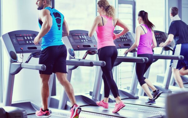 How To Run On A Treadmill: Basics, Benefits + 5 Fun Workouts To Try