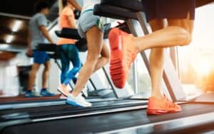 How To Run On A Treadmill: Basics, Benefits + 5 Fun Workouts To Try