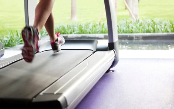 How To Run On A Treadmill: Basics, Benefits + 5 Fun Workouts To Try