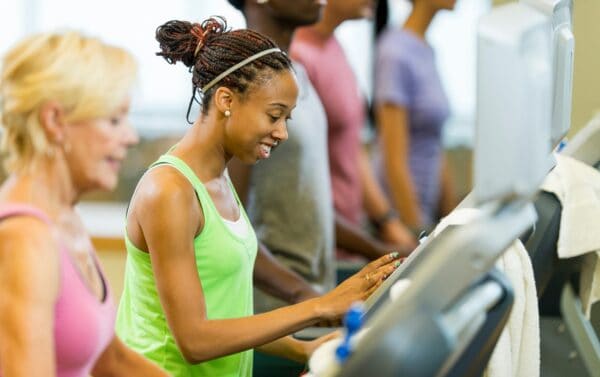 How To Run On A Treadmill: Basics, Benefits + 5 Fun Workouts To Try