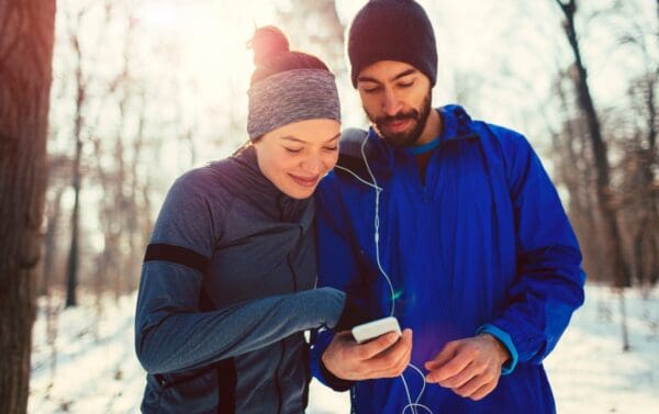 The 14 Best Running Podcasts For Your Next Workout