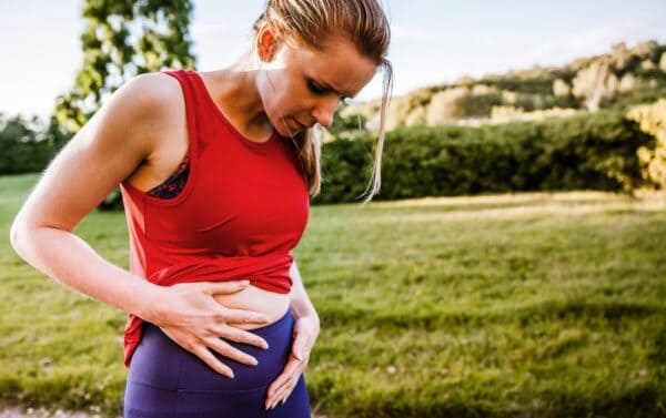 Stomach Pain After Running? Here Are 12 Possible Causes + Fixes