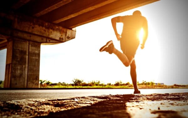 How To Run A 4-Minute Mile: Speed, Strength, + Workouts