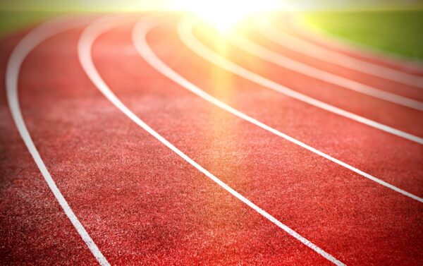 How To Run A 4-Minute Mile: Speed, Strength, + Workouts