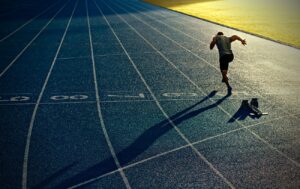 How To Run A 4-Minute Mile: Speed, Strength, + Workouts