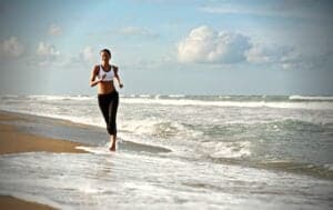 Running On The Beach: Sand Running Benefits + 10 Helpful Tips