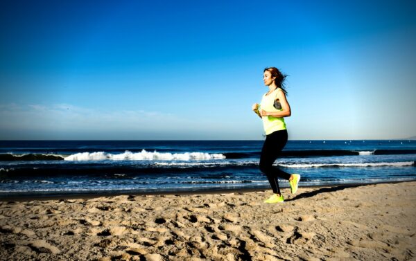 Running On The Beach: Sand Running Benefits + 10 Helpful Tips