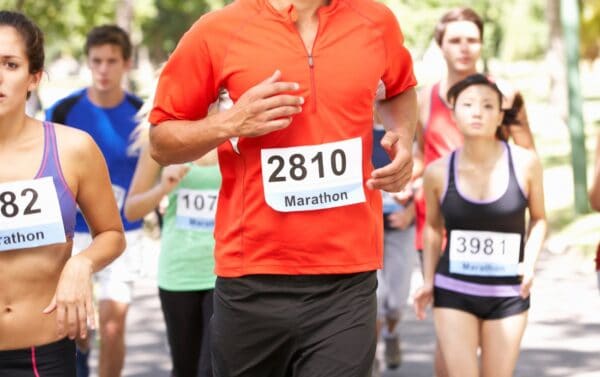 Marathon Pacers Explained: The Pros And Cons Of Running With A Pacer