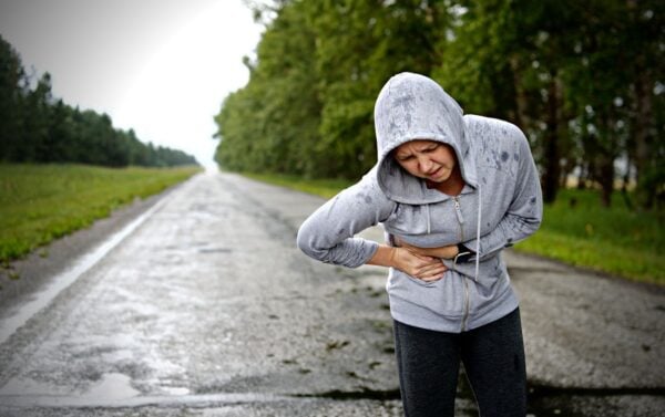 Ab Cramp During Exercise: Causes, Fixes + Prevention