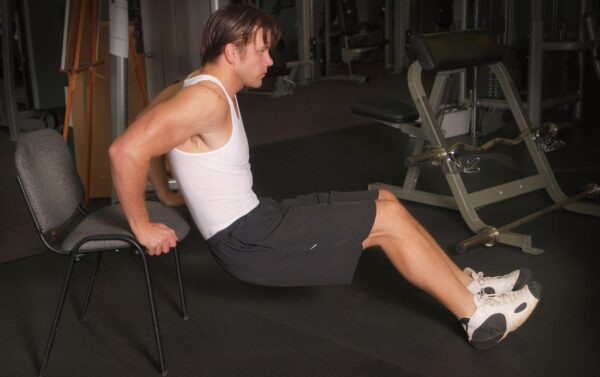 The Chair Dips Exercise: How To, Muscles Worked + Variations