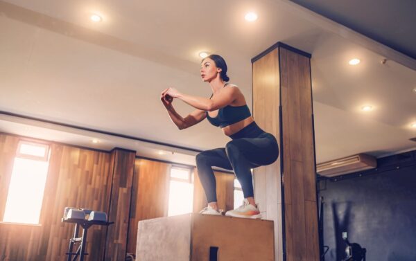 The 6 Best EMOM Workouts For Endurance, Strength, + Muscle Gain