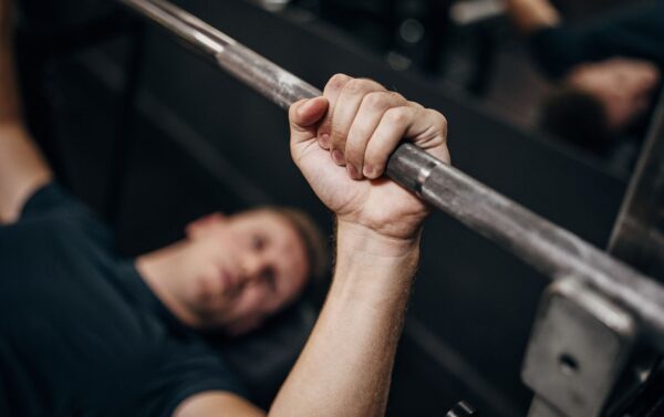 The 6 Best EMOM Workouts For Endurance, Strength, + Muscle Gain