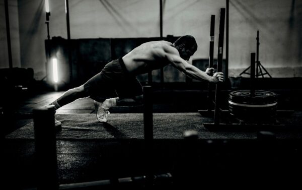 Hypertrophy Rep Range: How Many Reps + Sets For Muscle Gain?