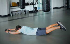 The Superman Exercise Guide: How To, Benefits, + 2 Beginner Variations