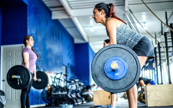 Pilates Vs Weight Training: Benefits + Disadvantages Of Each, Compared