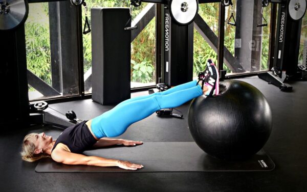 The 7 Best Stability Ball Exercises For Balance, Core Strength + Power