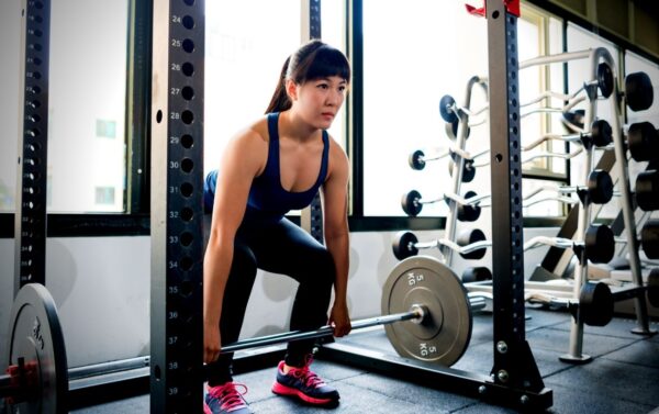 Sumo Deadlift Muscles Worked, Explained + 4 Sumo Squat Benefits